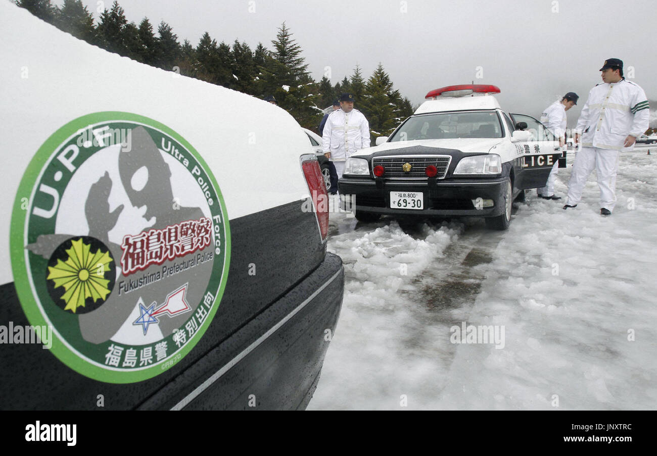 FUKUSHIMA, Japan - Members of the Ultra Police Force practice driving ...