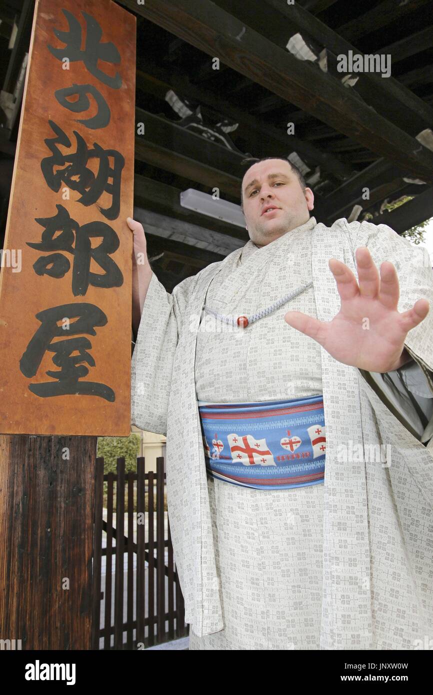 OSAKA, Japan - Georgia's Gagamaru poses for photos beside a signboard ...