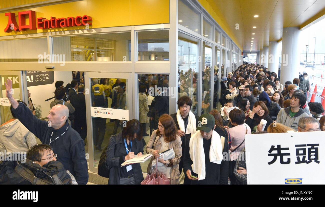 FUKUOKA, Japan - People line up ahead of the opening of Swedish ...
