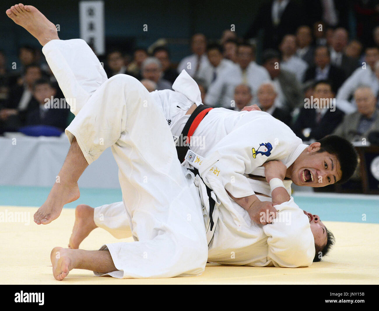 TOKYO, Japan - Hirotaka Kato (top) beats Ryuta Ishii in the final of the judo national ...