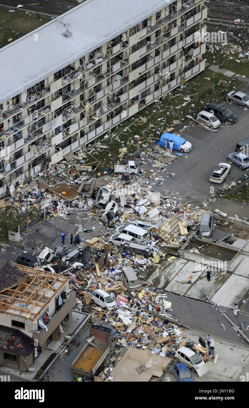 TOKYO, Japan - Photo taken from a Kyodo News helicopter shows a damaged ...