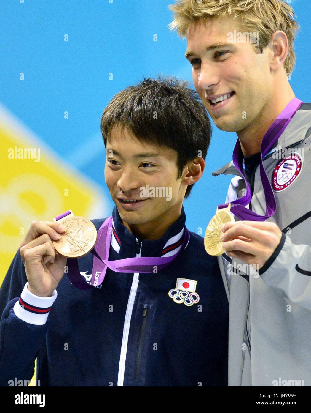 LONDON, Britain - Ryosuke Irie (L) of Japan and Matthew Grevers of the ...