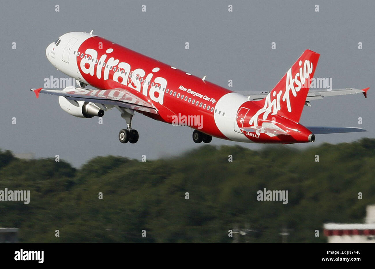 NARITA, Japan - The first flight of AirAsia Japan Co. takes off from ...