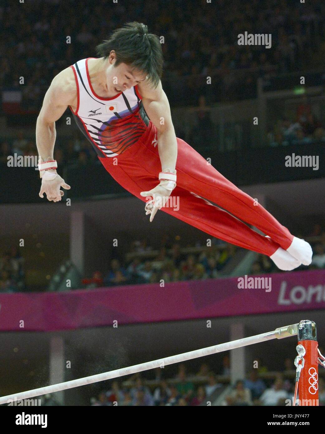 LONDON, Britain - Japan's Kohei Uchimura performs a difficult routine ...