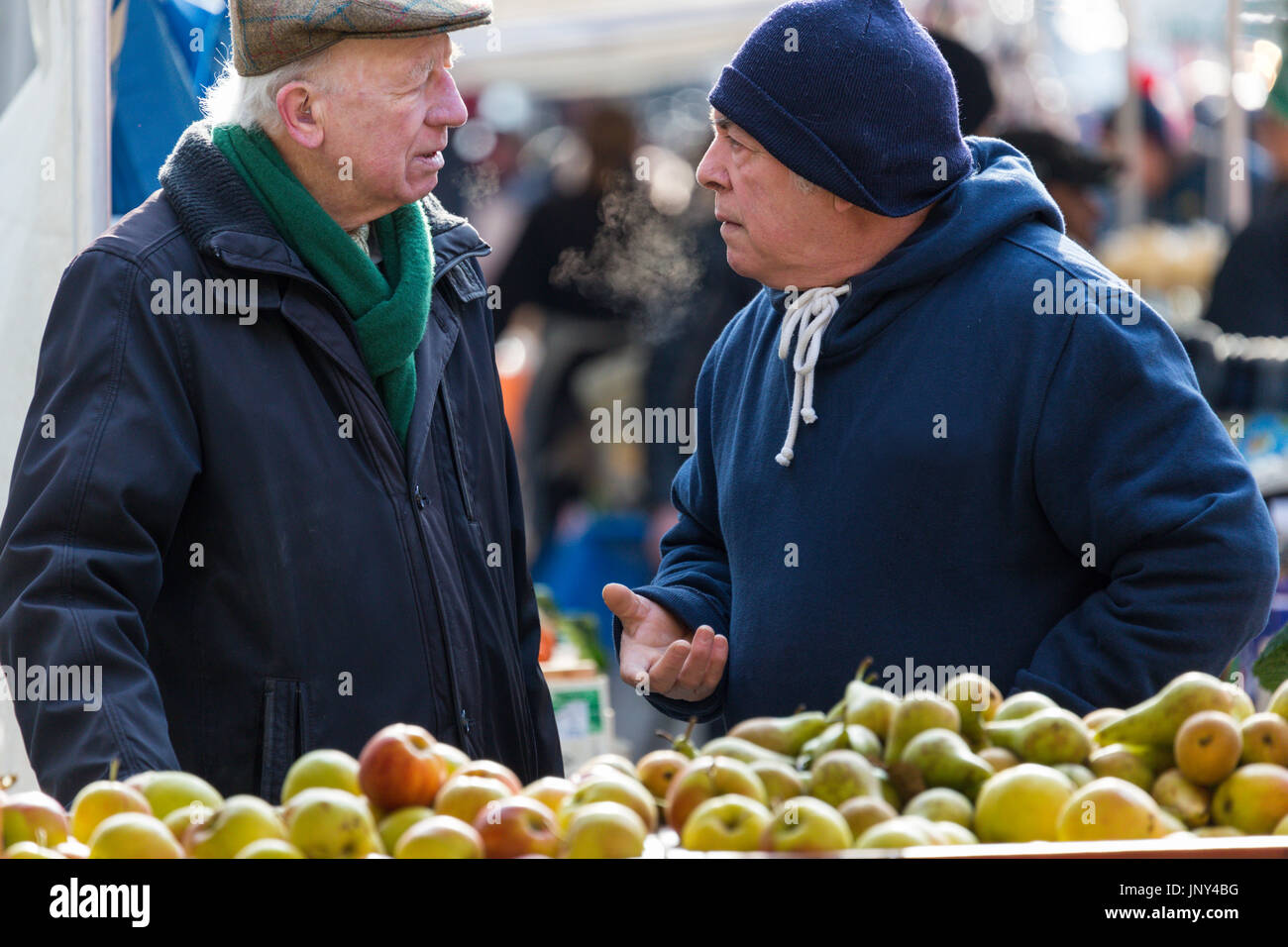 Paris. France - February 27, 2016: Two Frenchmen in conversation at the ...