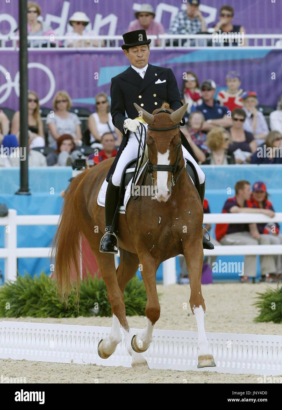 LONDON, Britain - Japan's Hiroshi Hoketsu, the oldest athlete taking ...
