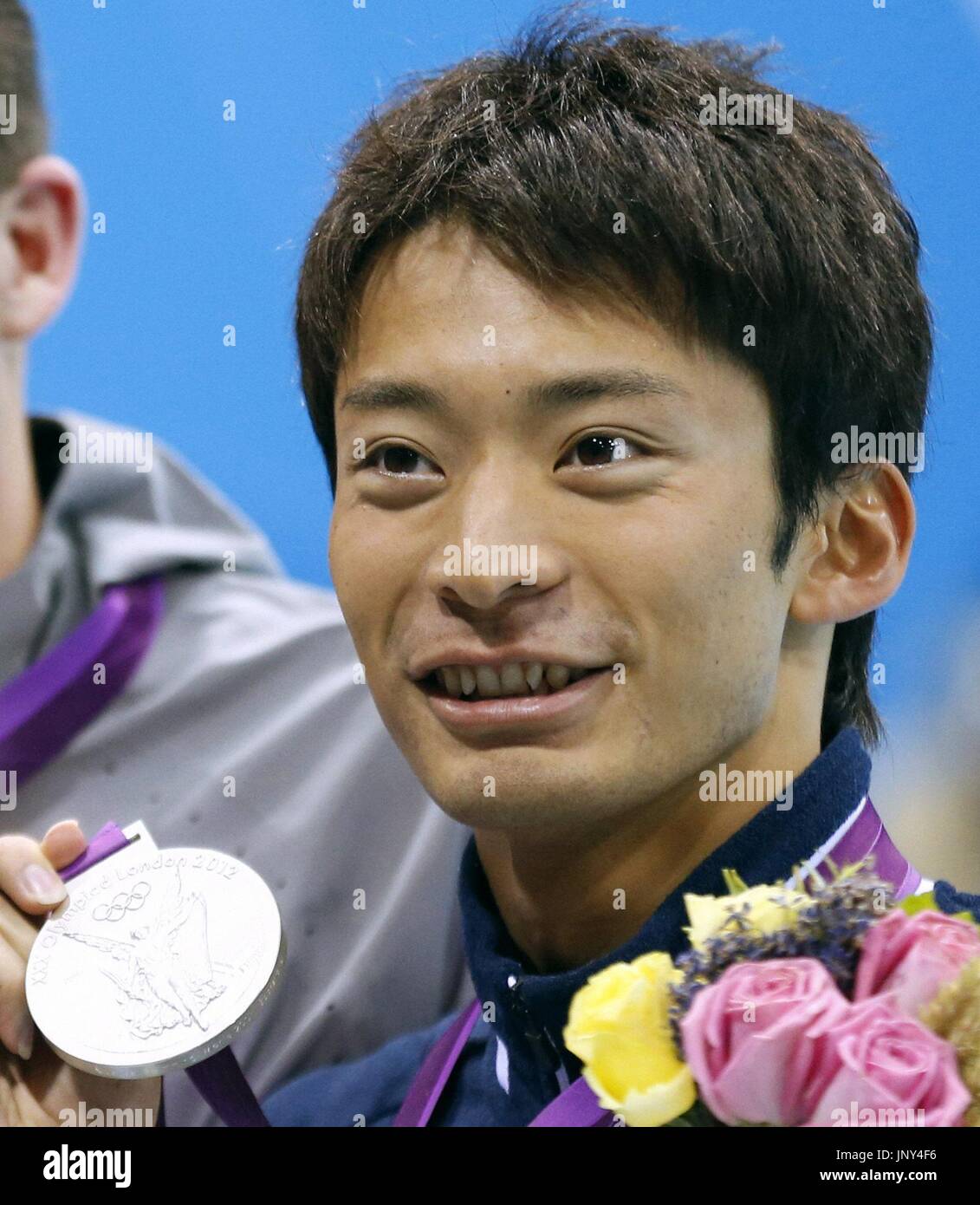 LONDON, Britain - Japan's Ryosuke Irie poses with the silver medal he ...