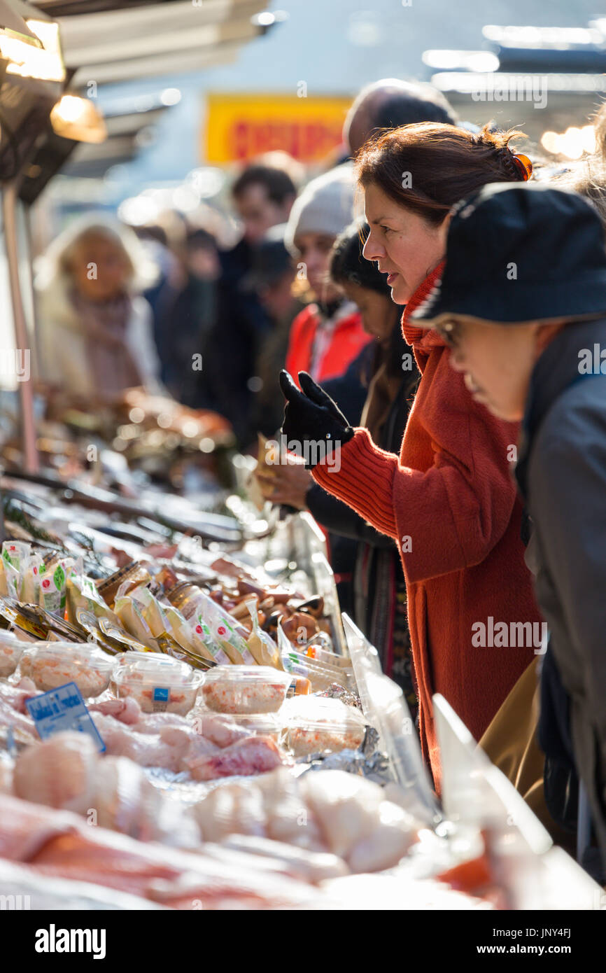 Paris. France - February 27, 2016: Customers shopping for meat at the ...