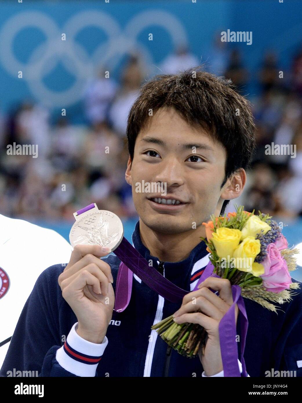 LONDON, Britain - Japan's Ryosuke Irie poses for photos with the silver ...