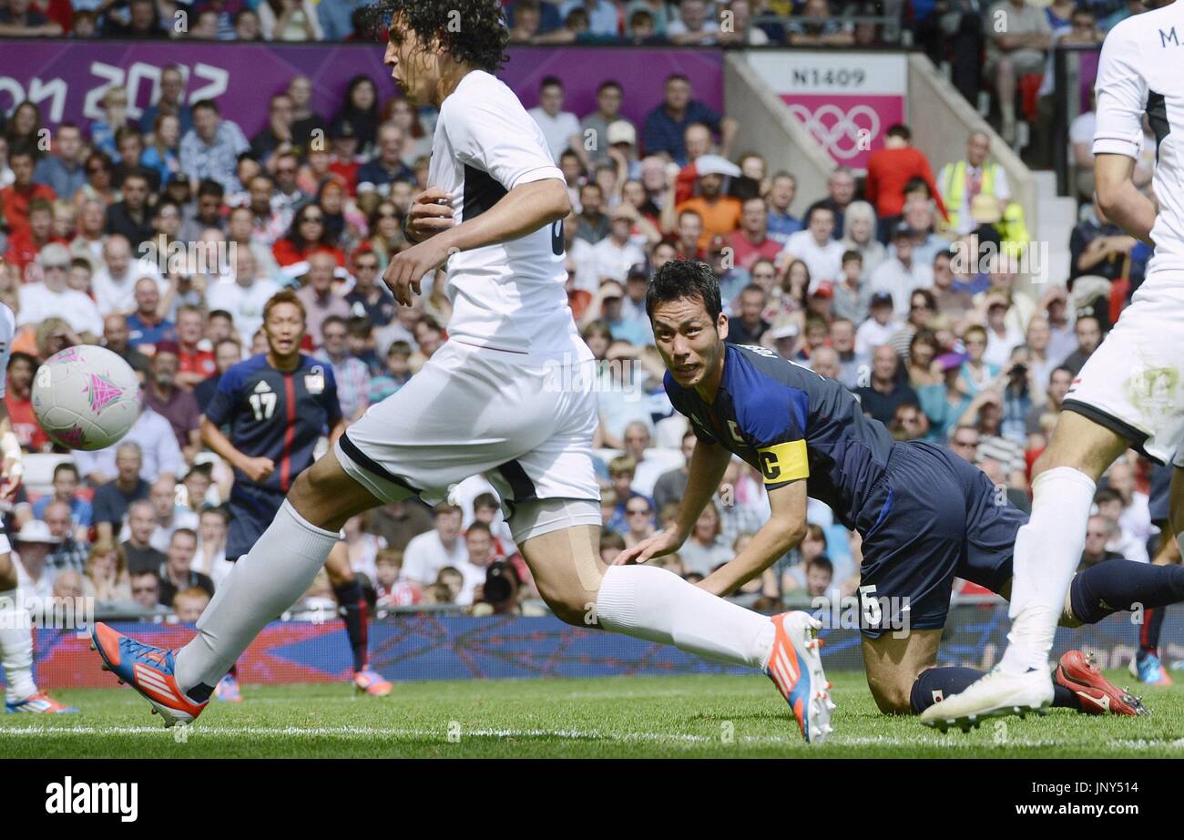 MANCHESTER, Britain - Japan captain Maya Yoshida (back C) heads home ...