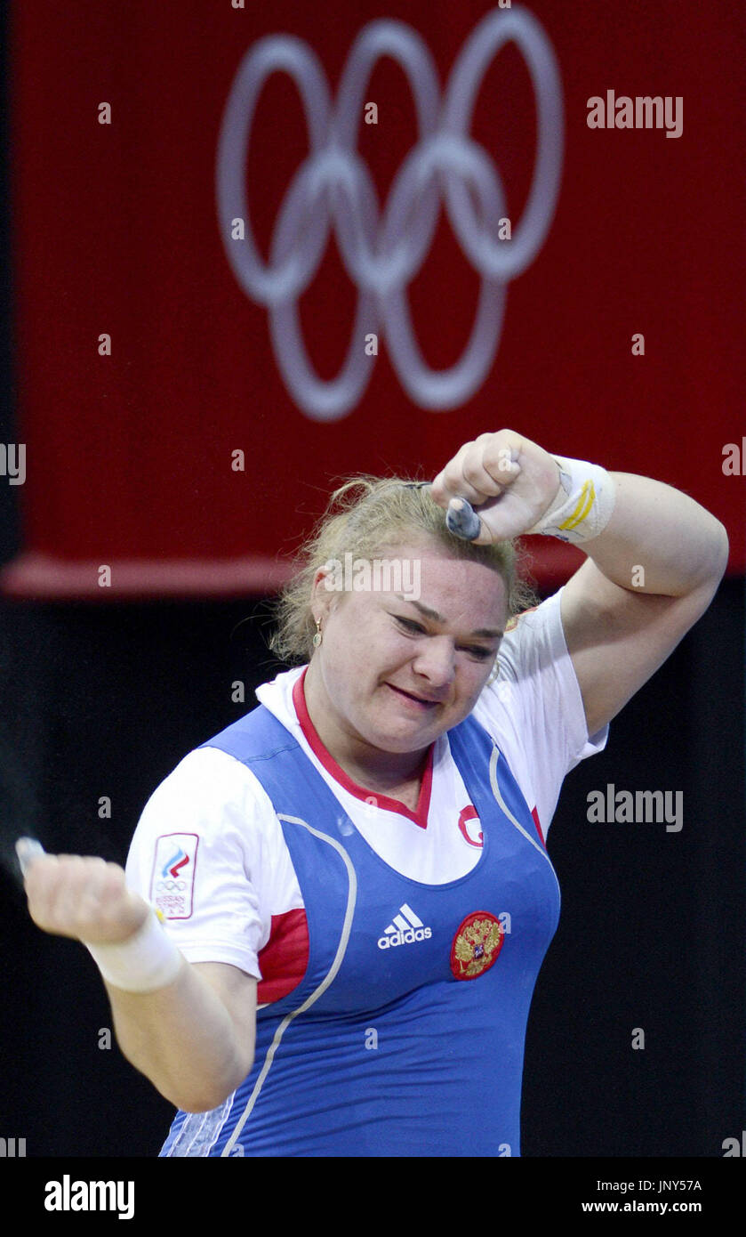 London, Britain - Russia's Tatiana Kashirina celebrates after lifting ...