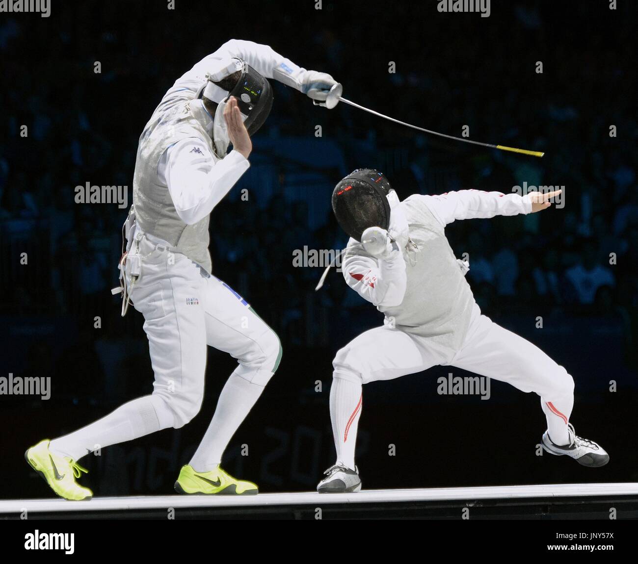 LONDON, Britain - Japan's Yuki Ota (R) takes on an Italian player in ...