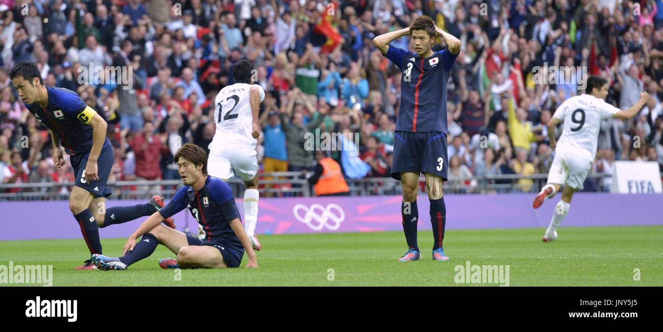 LONDON, Britain - Japan's Takahiro Ogihara (3), Maya Yoshida (L) and ...