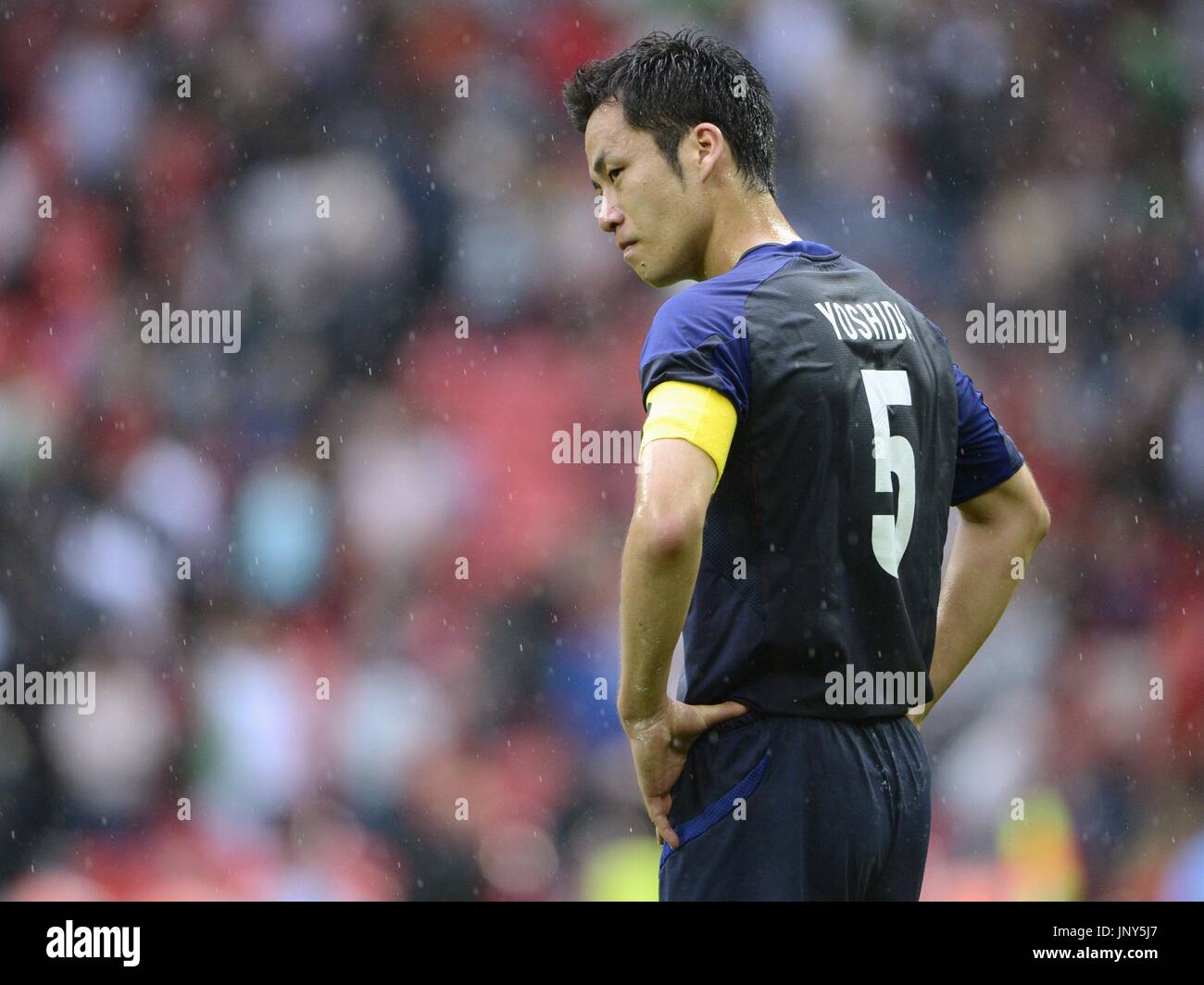 LONDON, Britain - Japan's captain Maya Yoshida reacts after losing a ...