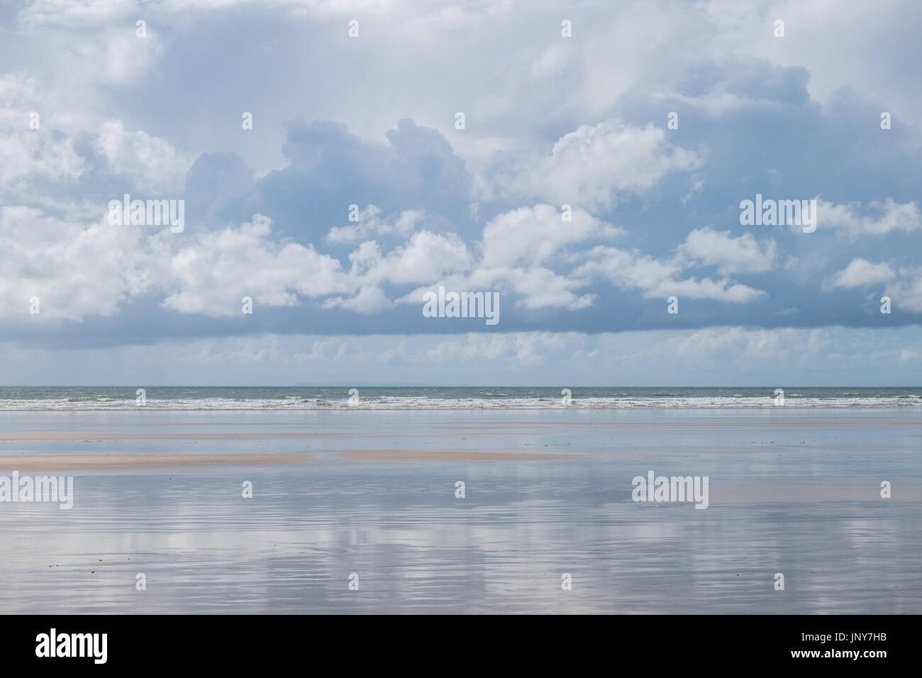 The beautiful summer reflections of Westward Ho Beach in North Devon ...
