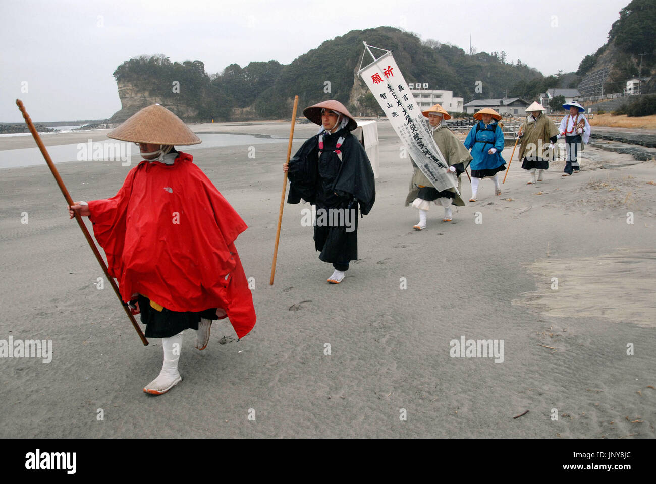 IWAKI, Japan - Buddhist monks walk along Nakoso Beach in Iwaki ...