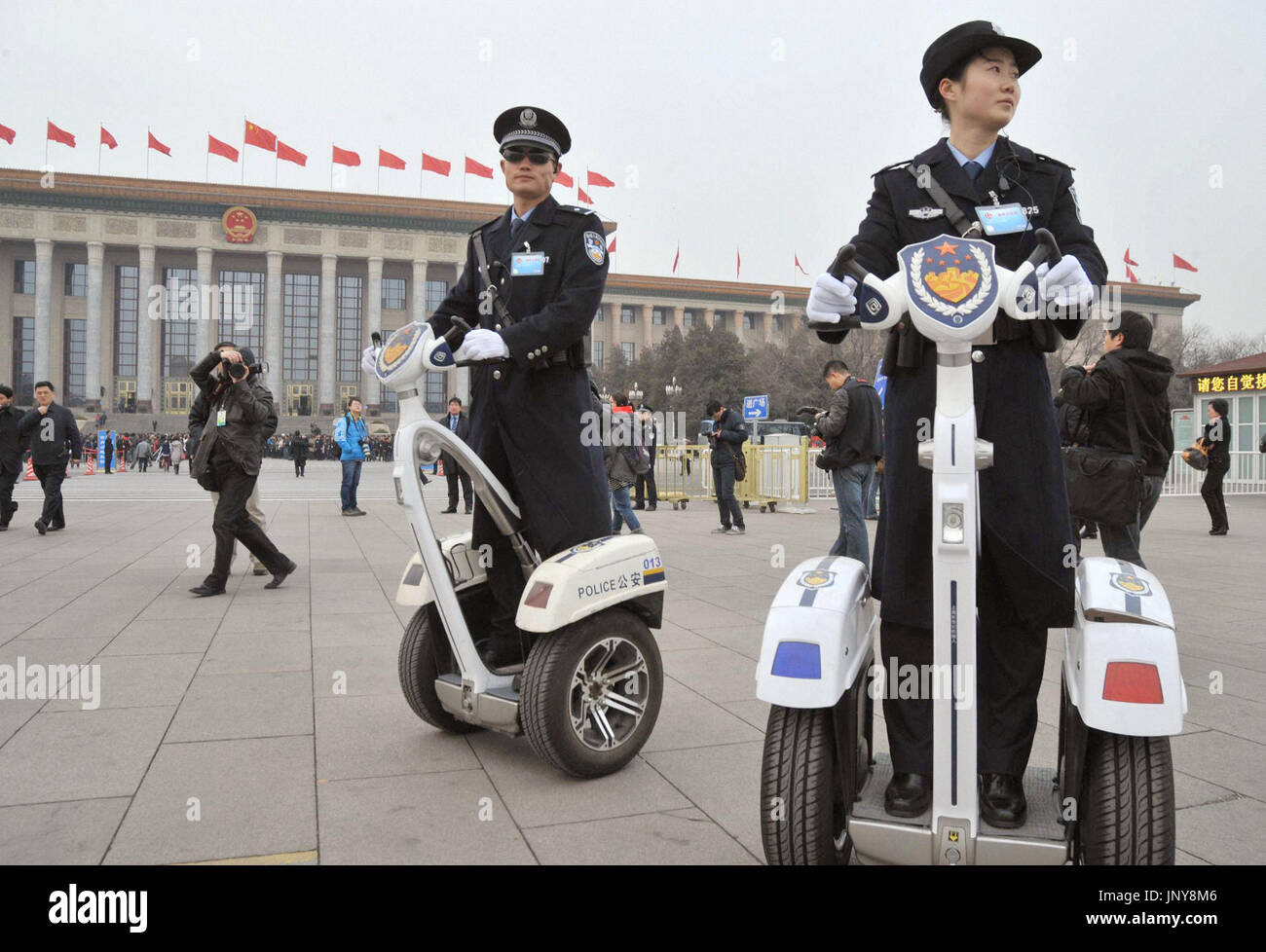 BEIJING, China - Chinese police officers patrol Tiananmen Square in ...