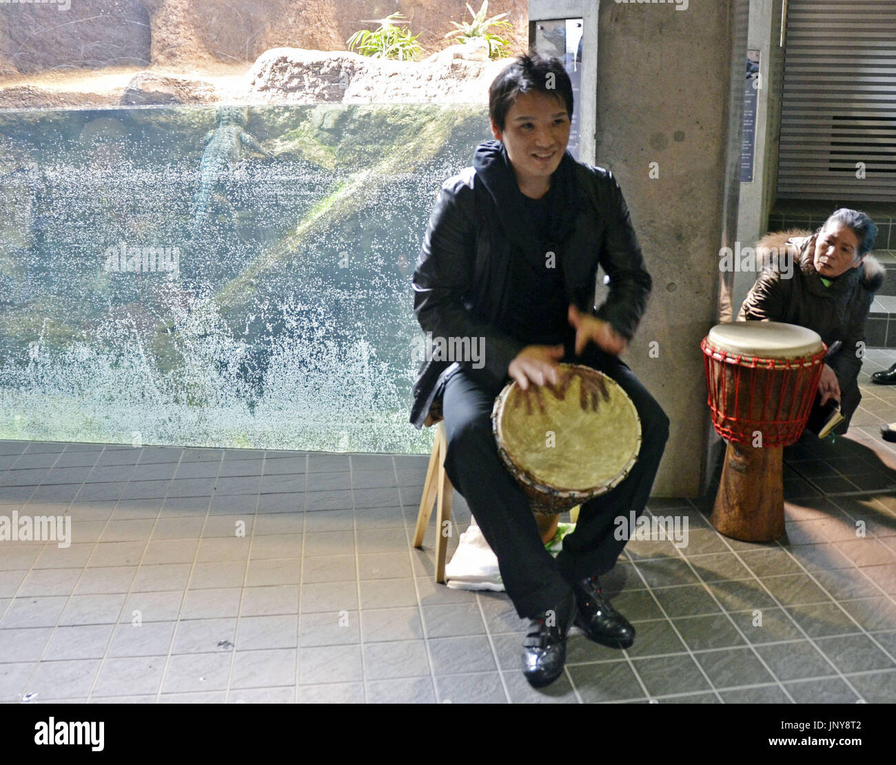 SAPPORO, Japan - Percussionist Goshin Moro plays a drum in front of an ...
