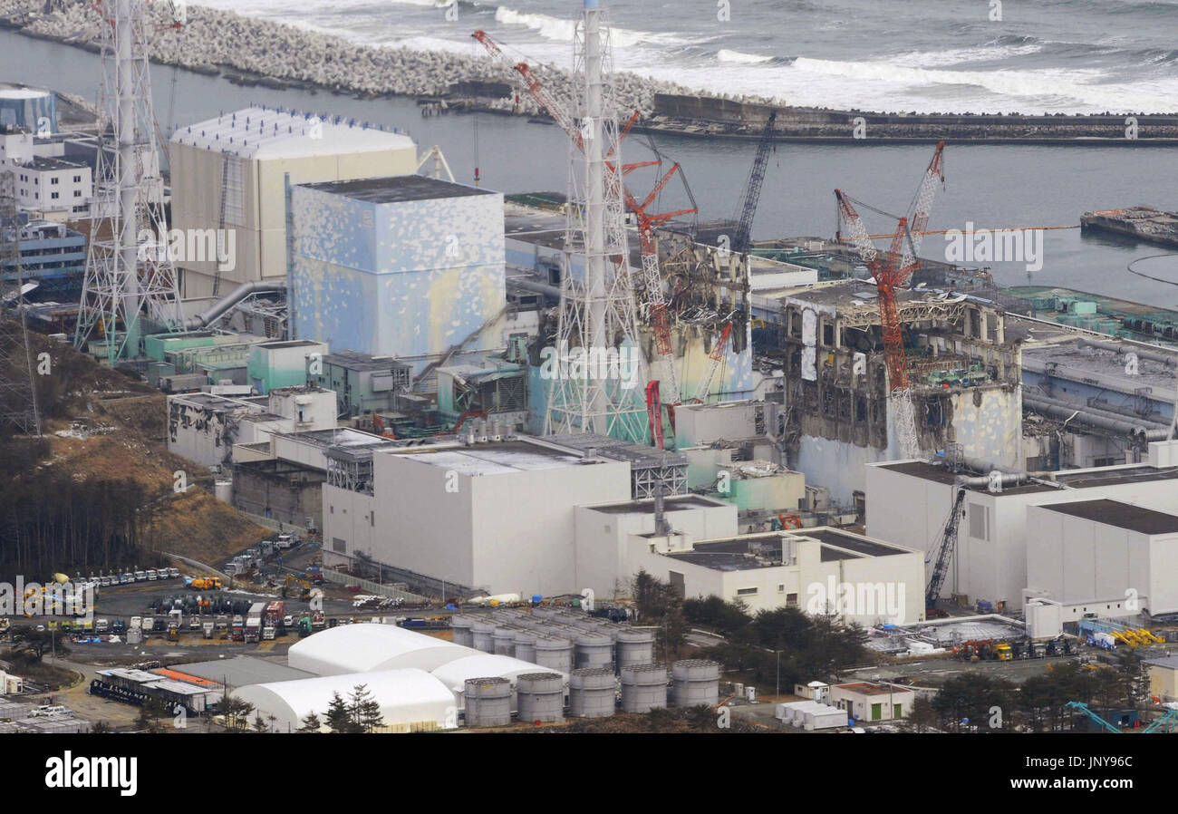 TOKYO, Japan - Photo taken from a Kyodo News helicopter shows (from R ...