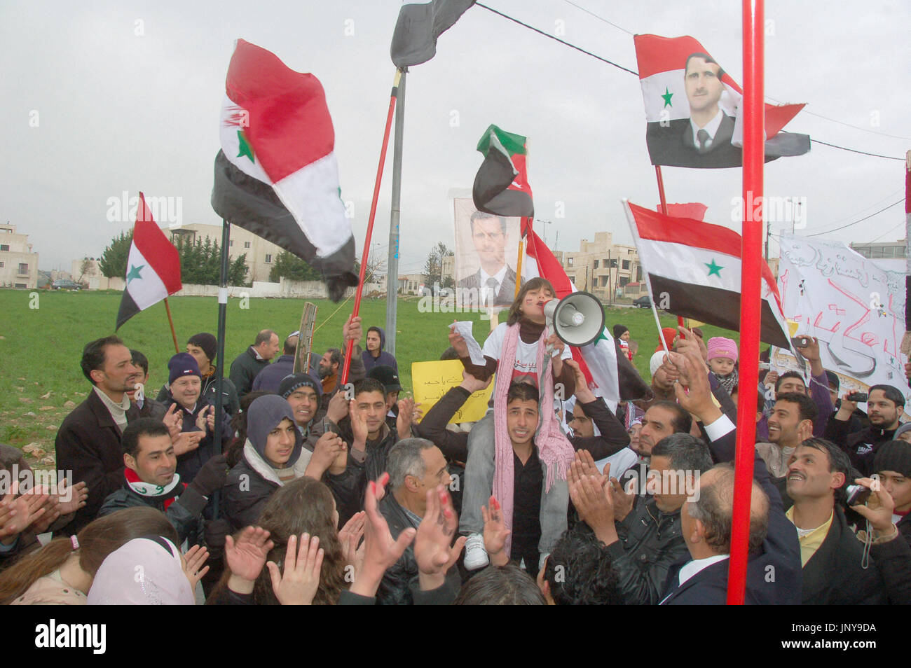 AMMAN, Jordan - About 200 Syrians stage a pro-Syrian government ...