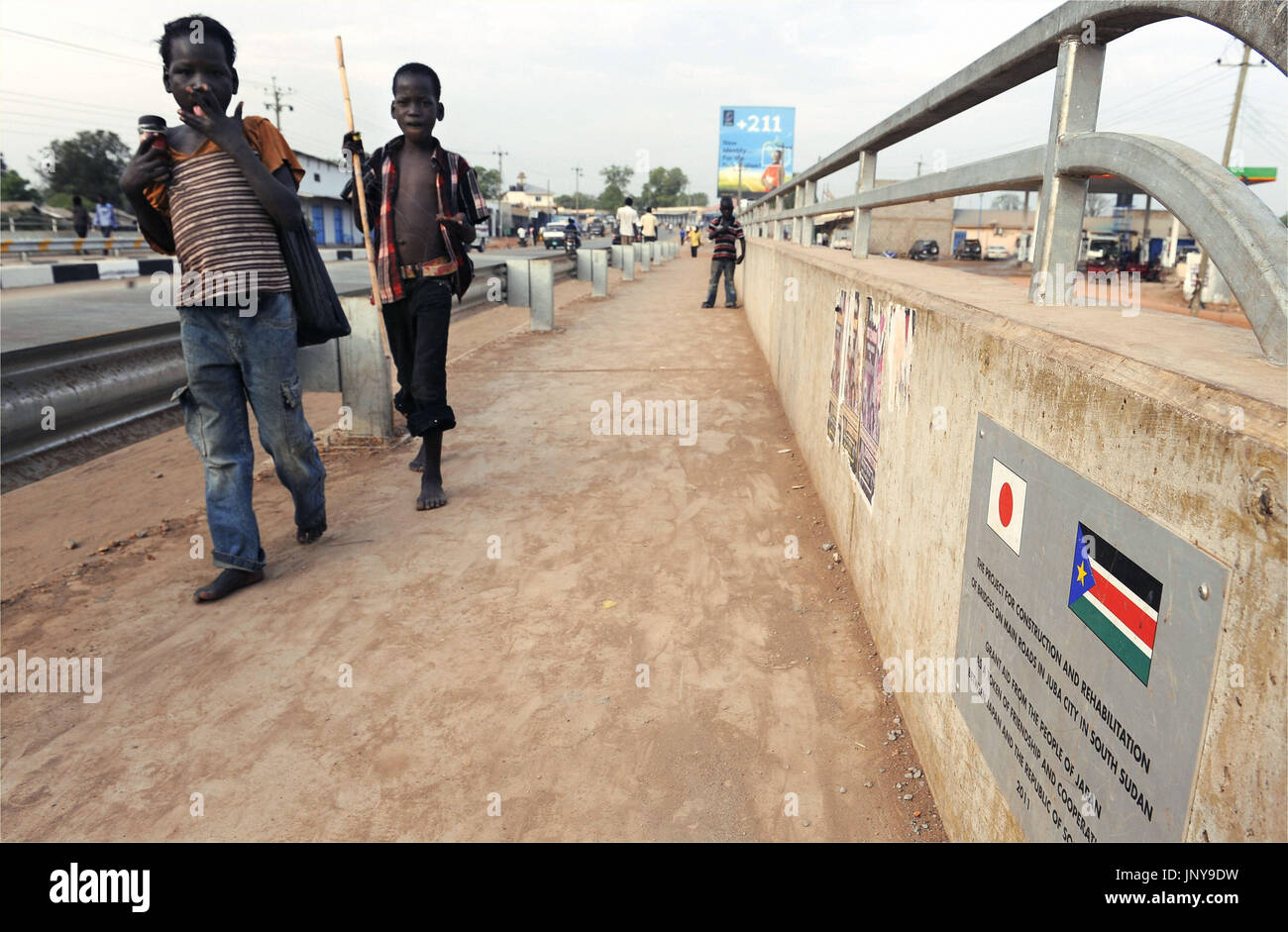 JUBA, South Sudan - The flags of Japan and South Sudan are seen beside ...