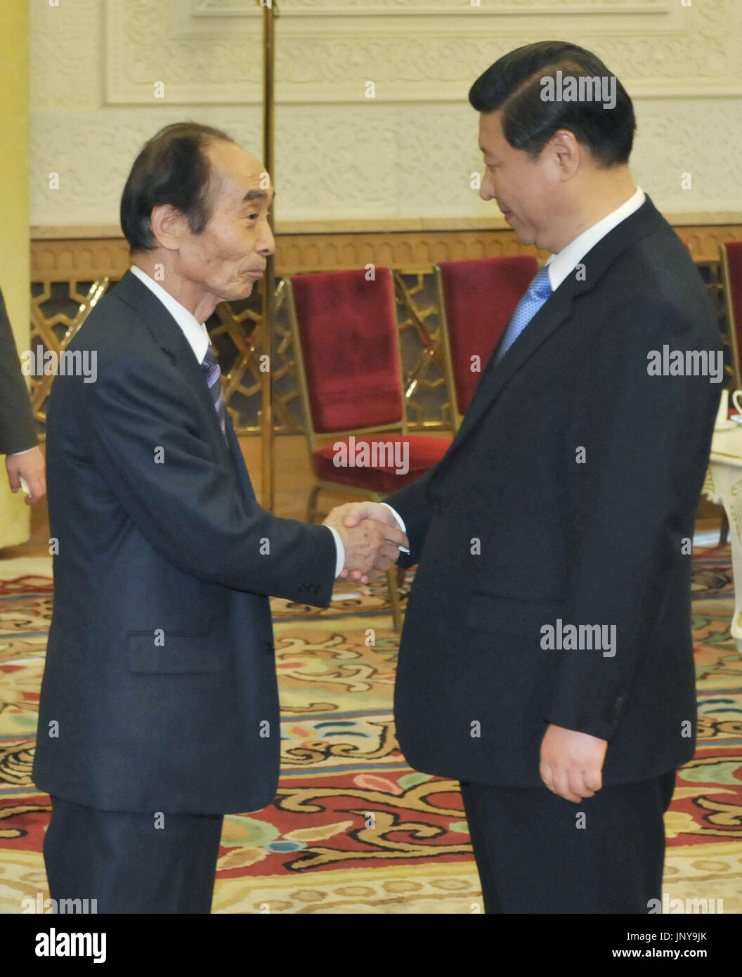 BEIJING, China - Azuma Koshiishi (L), secretary general of the ...