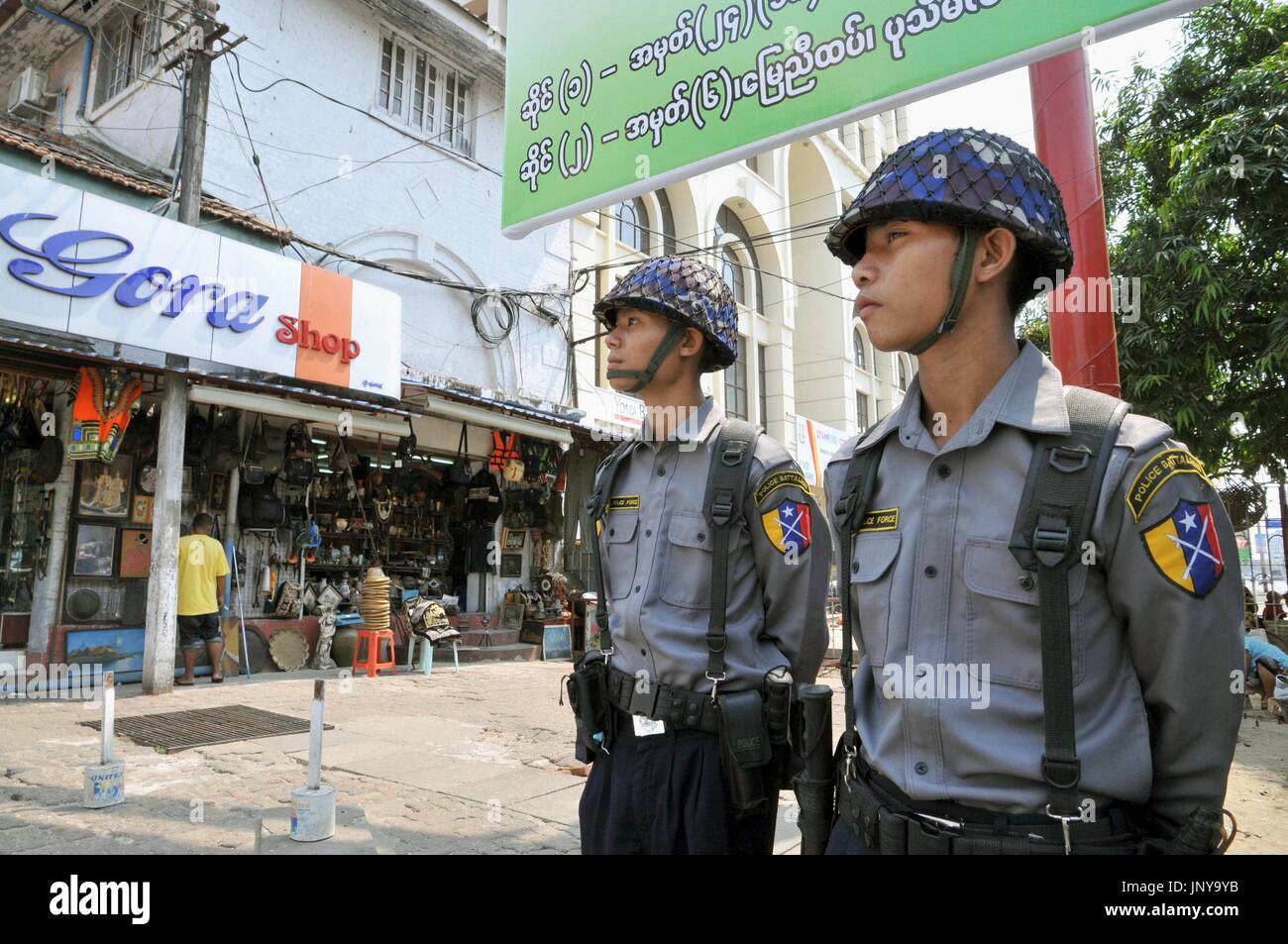 YANGON, Myanmar - Police officers stand guard in Yangon, Myanmar, on ...