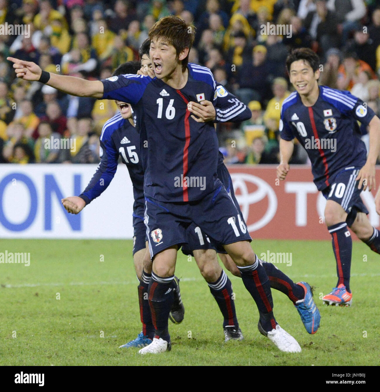 BRISBANE, Australia - Japan defender Yuzo Kurihara (16) celebrates ...
