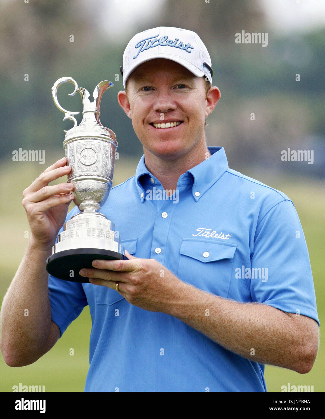 KASAOKA, Japan - Brad Kennedy of Australia smiles while holding the ...