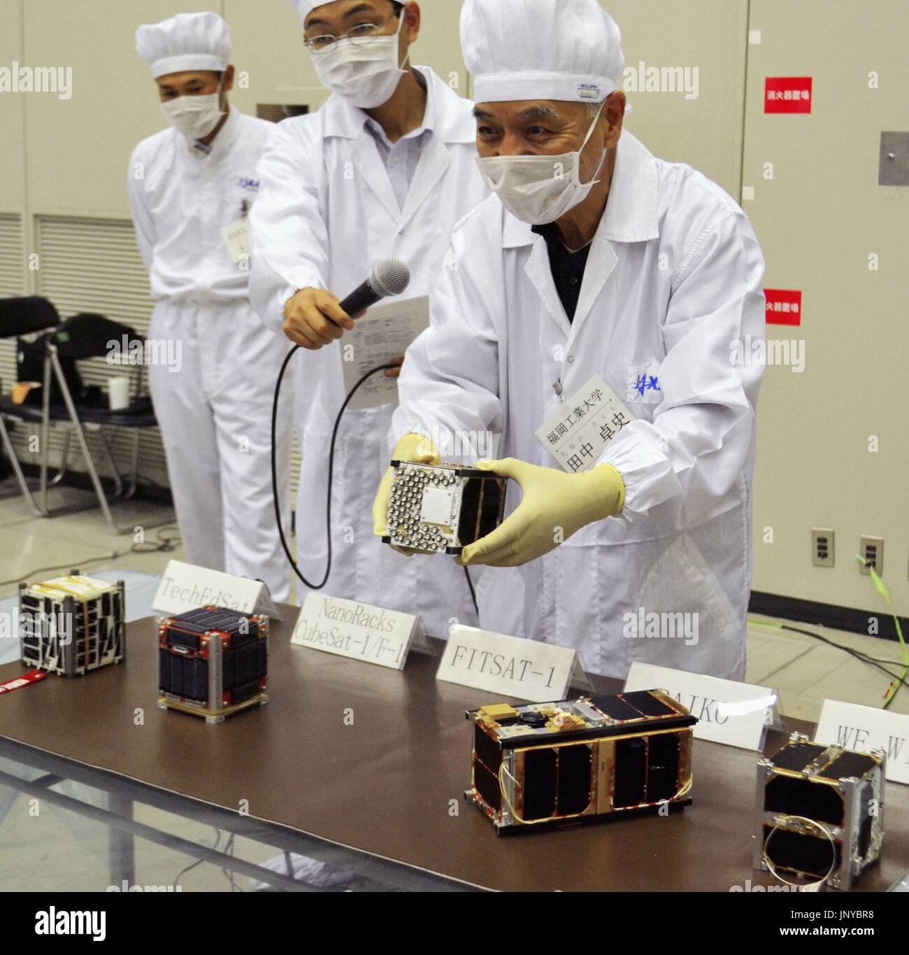 TOKYO, Japan - Photo shows five small satellites to be put into orbit ...