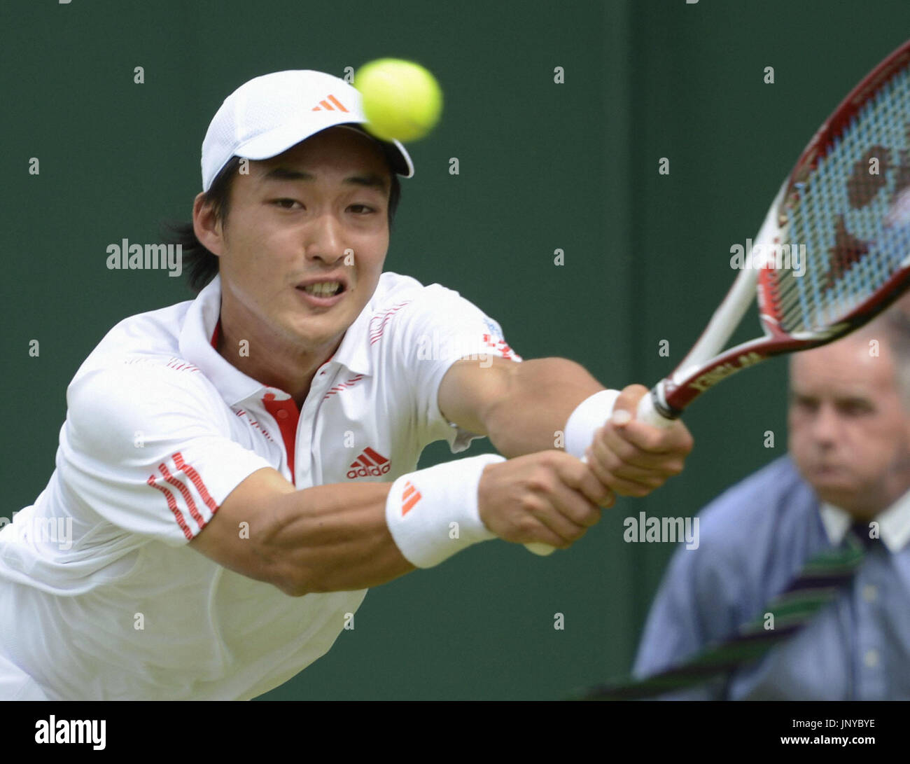 WIMBLEDON, England - Japan's Go Soeda hits a return against Igor ...