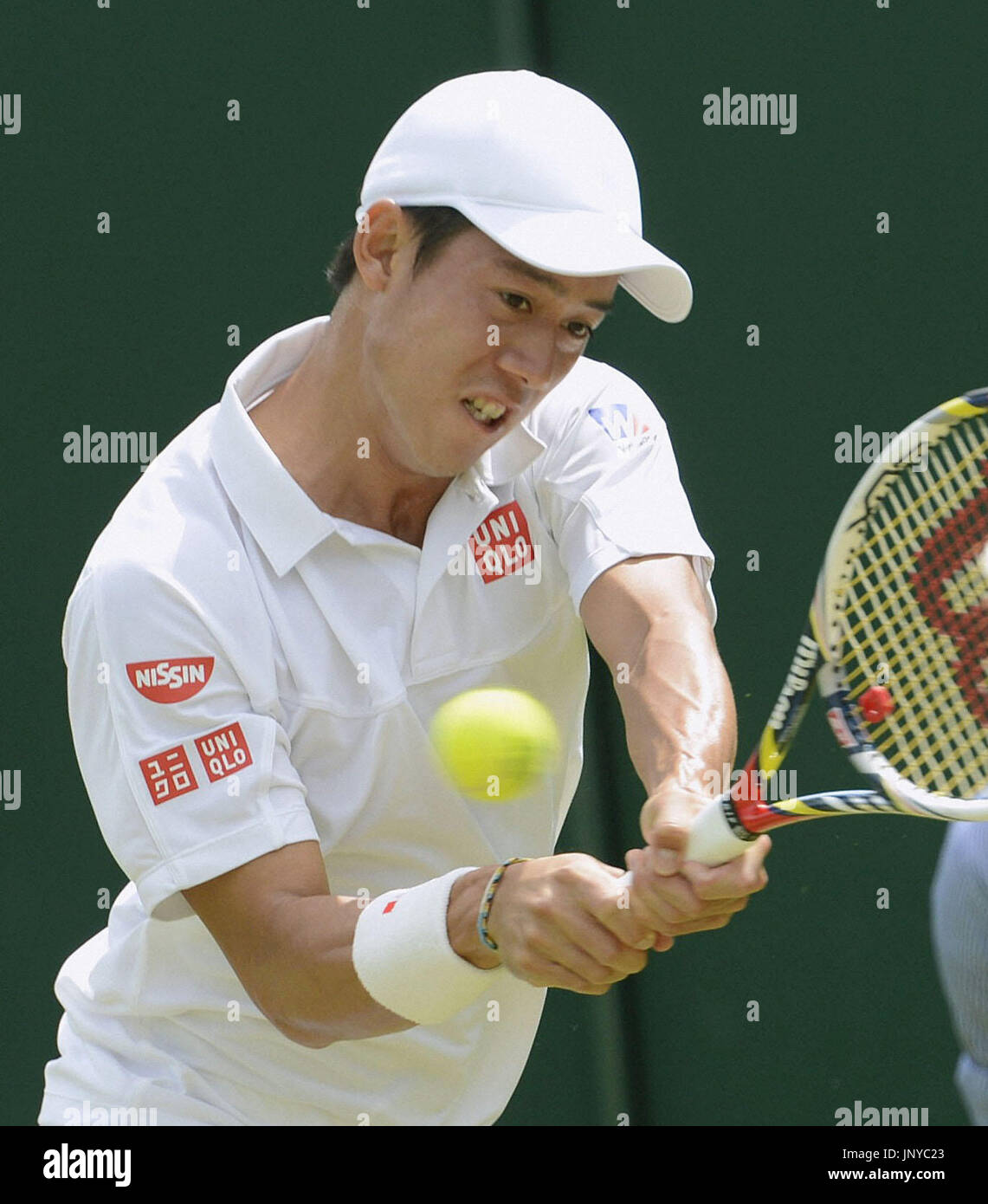 LONDON, Britain - Japan's Kei Nishikori plays Frenchman Florent Serra ...
