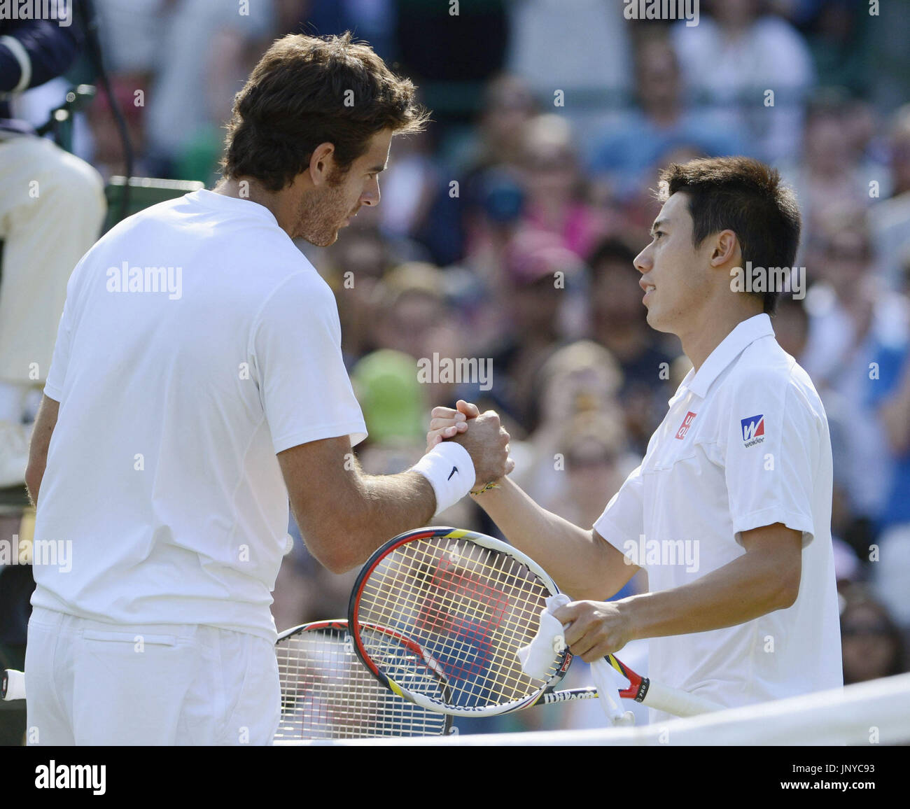 LONDON, Britain - Japan's Kei Nishikori (R) and Juan Martin Del Potro ...