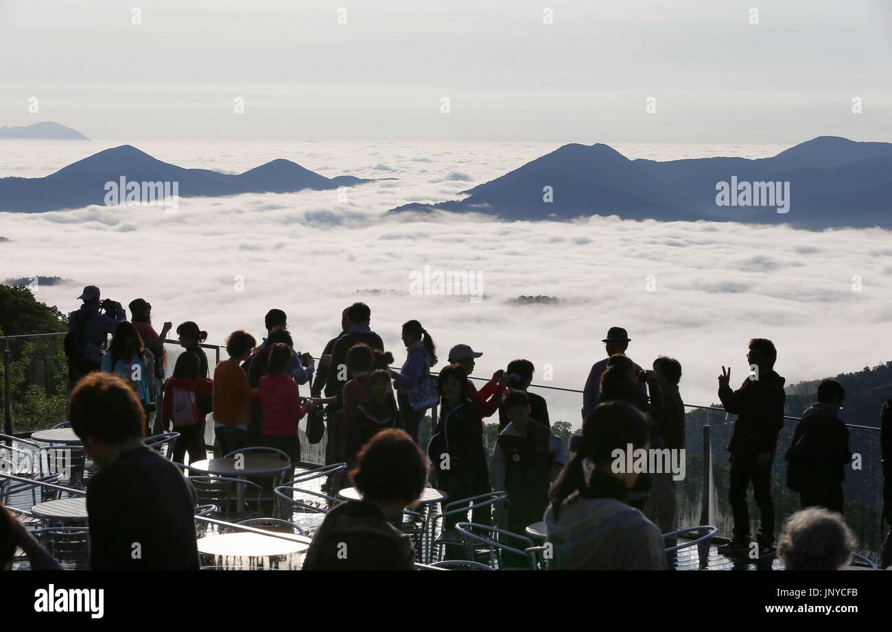 SAPPORO, Japan - Visitors view a sea of clouds in the village of ...