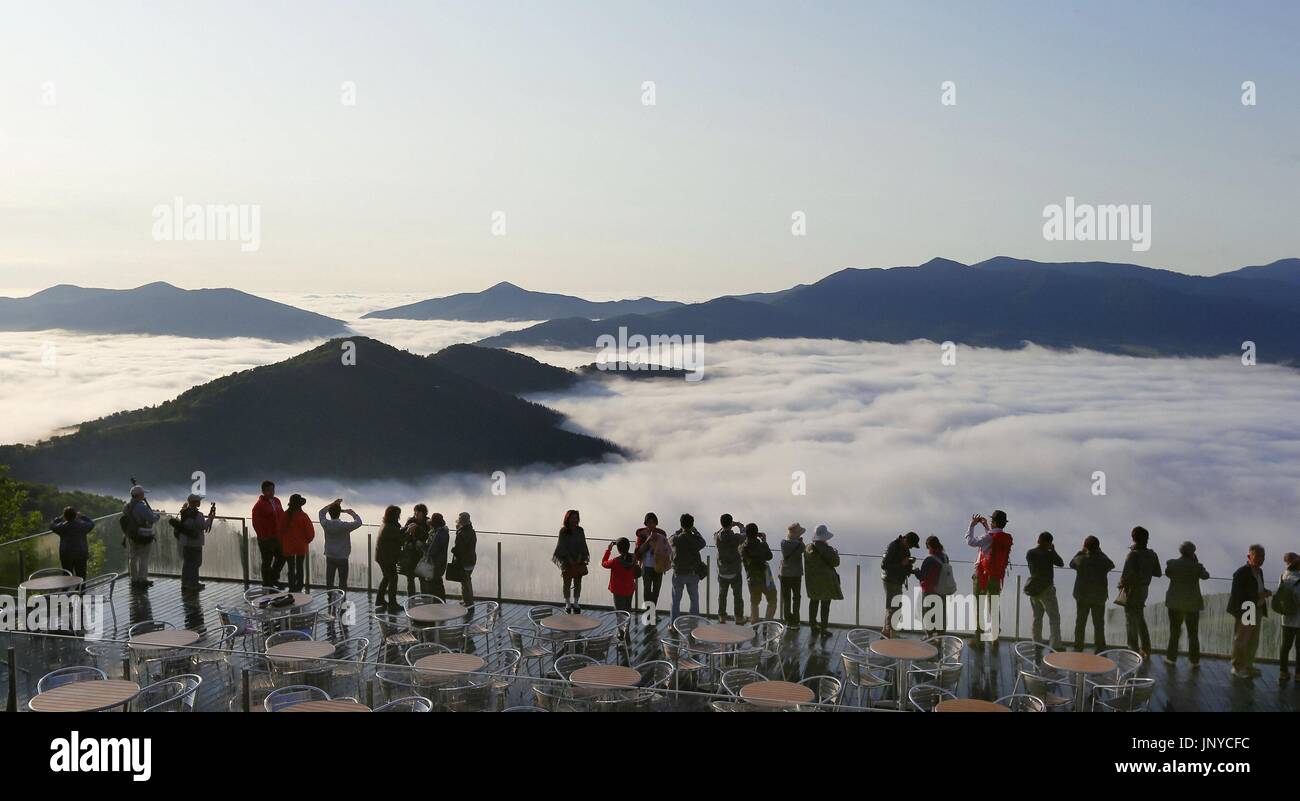 SAPPORO, Japan - Visitors view a sea of clouds in the village of ...