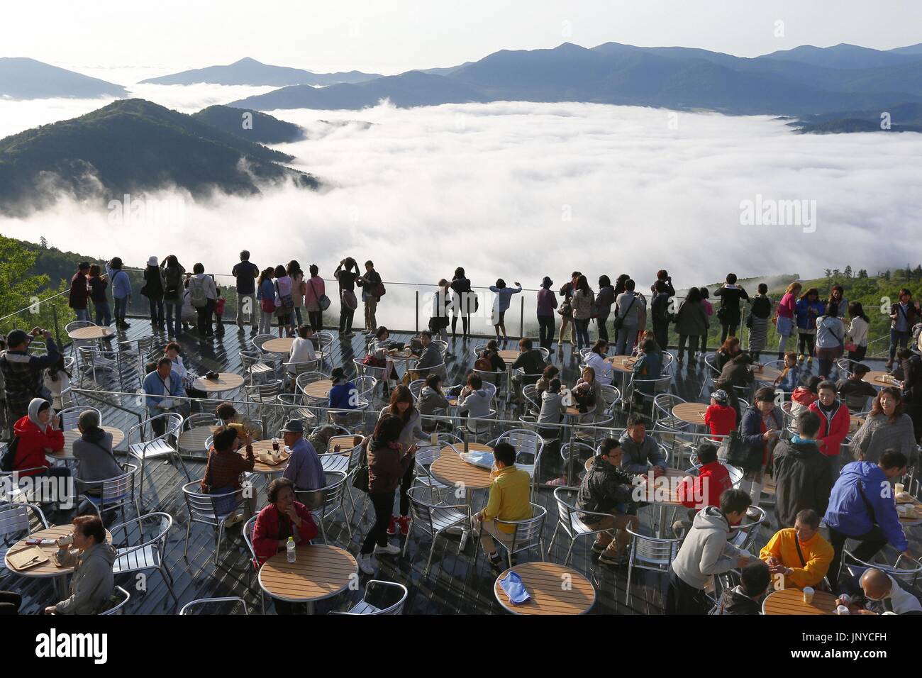 SAPPORO, Japan - Visitors view a sea of clouds in the village of ...