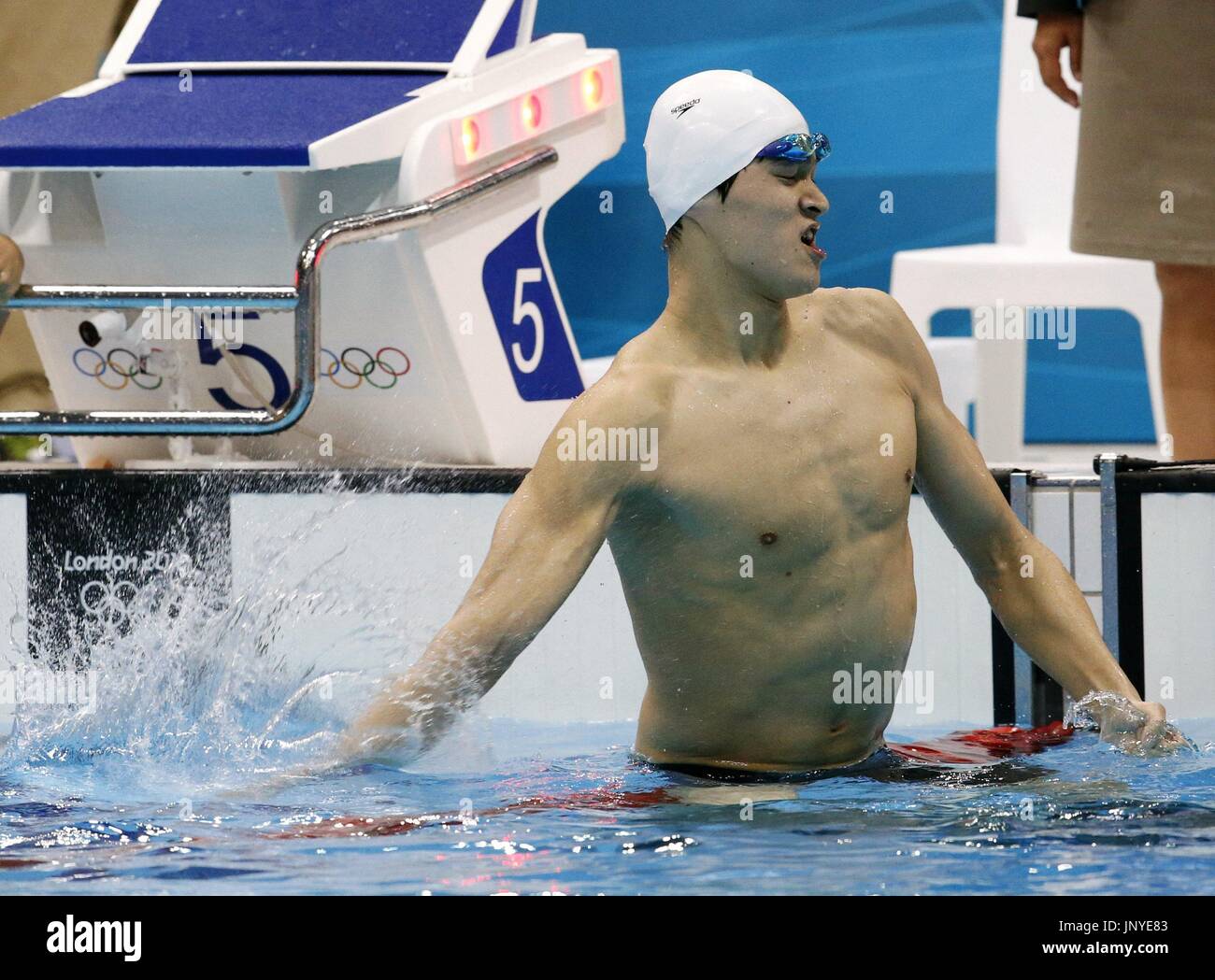 LONDON, Britain - China's Sun Yang celebrates after winning the men's ...