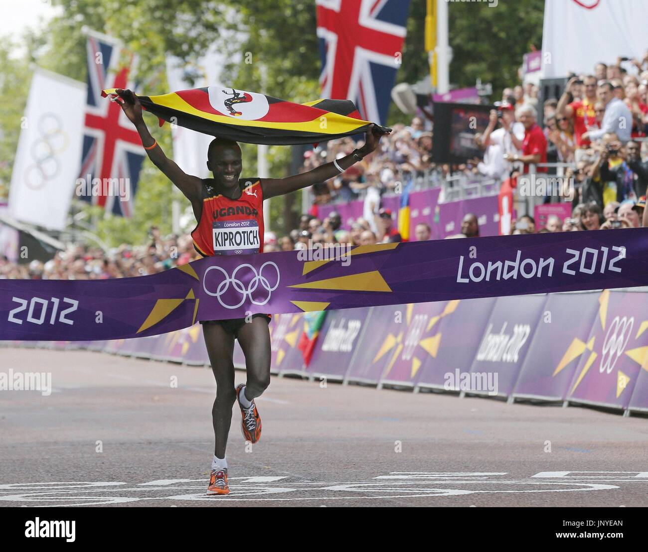 LONDON, Britain - Uganda's Stephen Kiprotich wins the gold medal in the ...
