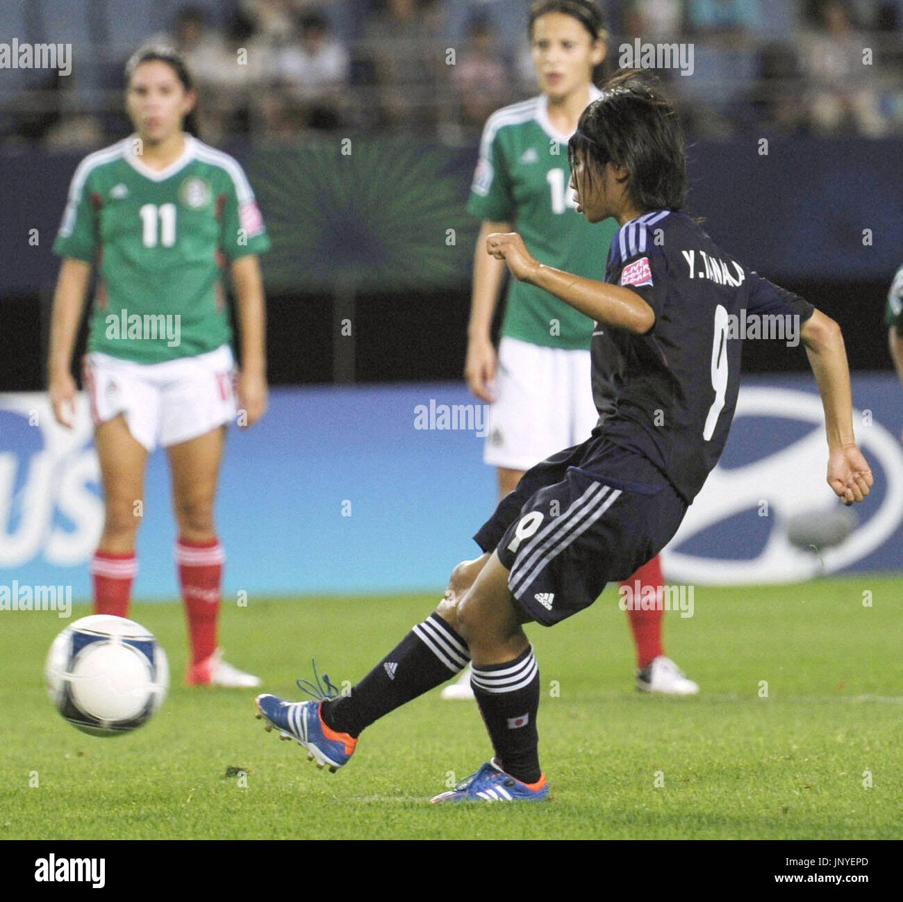 RIFU, Japan - Japan's Yoko Tanaka scores the team's fourth goal against ...