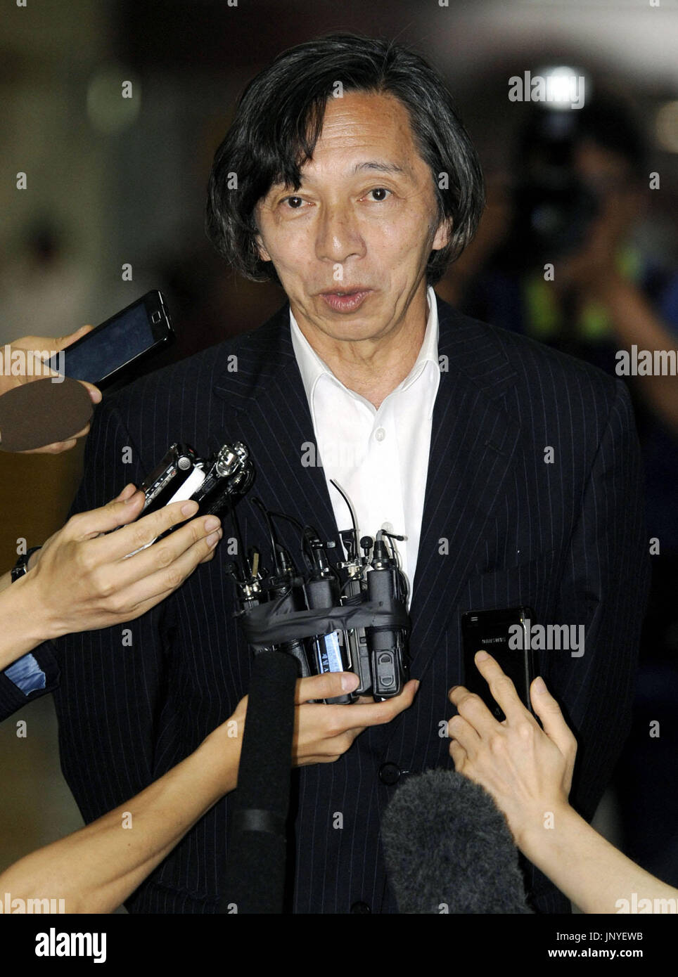 SEOUL, South Korea - Japanese Ambassador to South Korea Masatoshi Muto answers reporters ...