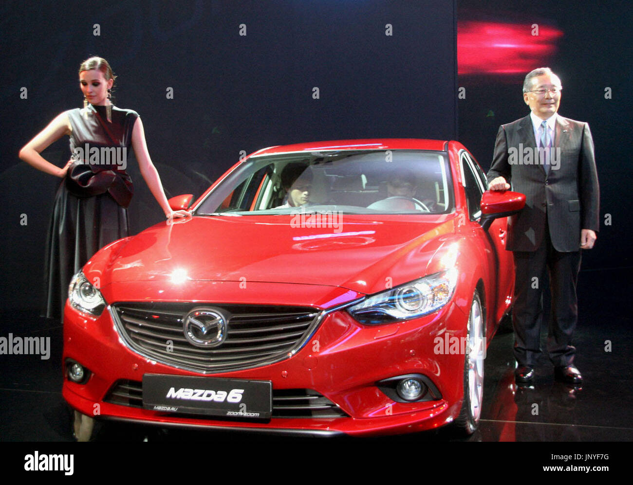 MOSCOW, Russia - Mazda Motor Corp. President Takashi Yamanouchi (R ...