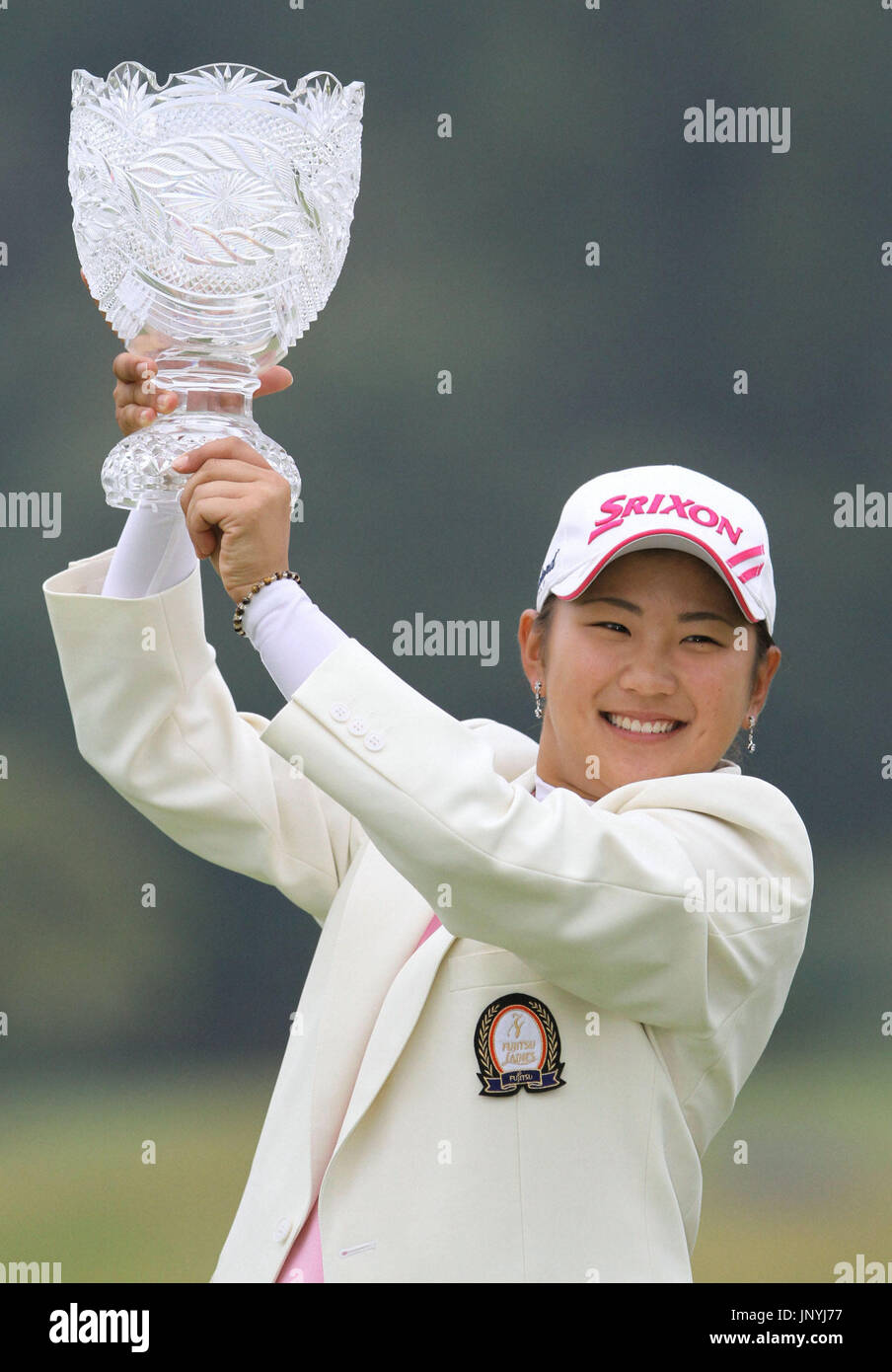 CHIBA, Japan - Japan's Misuzu Narita holds the victor's trophy after ...
