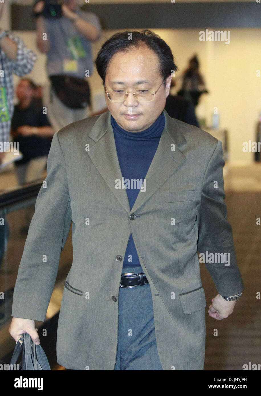 NARITA, Japan - Researcher Hisashi Moriguchi arrives at Narita airport ...