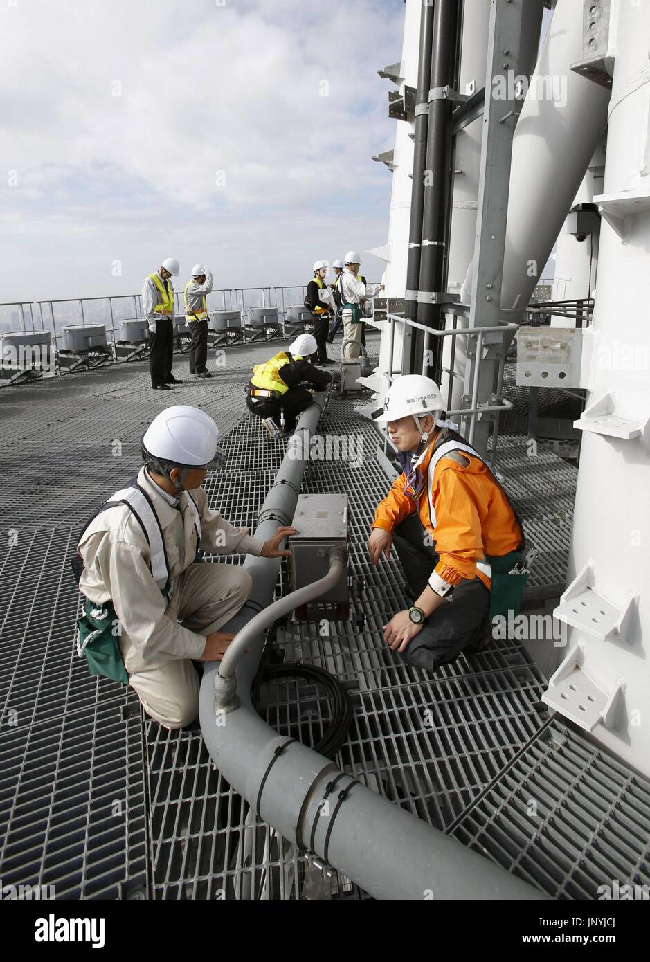 TOKYO, Japan - An apparatus (pipe at C) installed 497 meters above ...