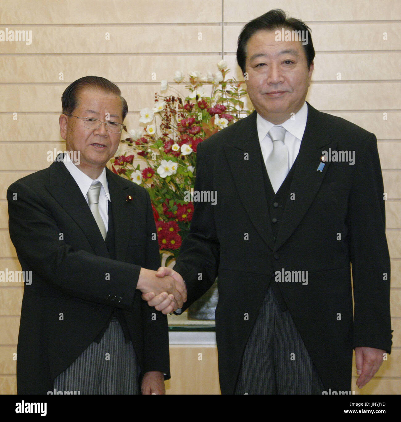 TOKYO, Japan - Justice Minister Minoru Taki (L) and Prime Minister ...