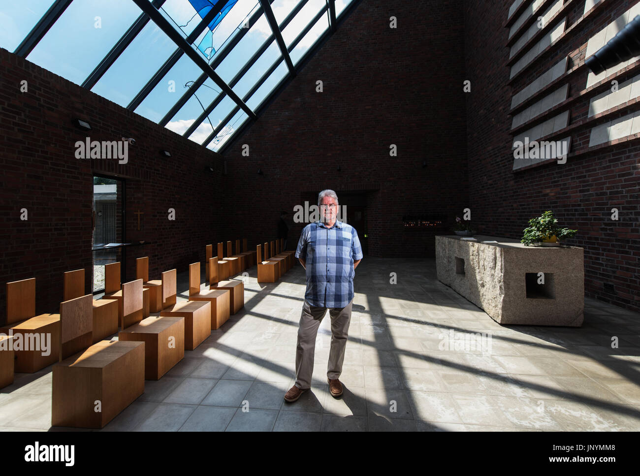 The protestant pastor Utz Machert stands inside the motorway church at ...