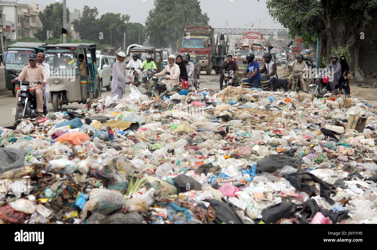Huge heap of garbage on National Highway nearby Malir showing ...