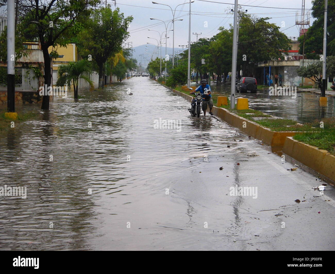 Rain causes flooding hi-res stock photography and images - Alamy