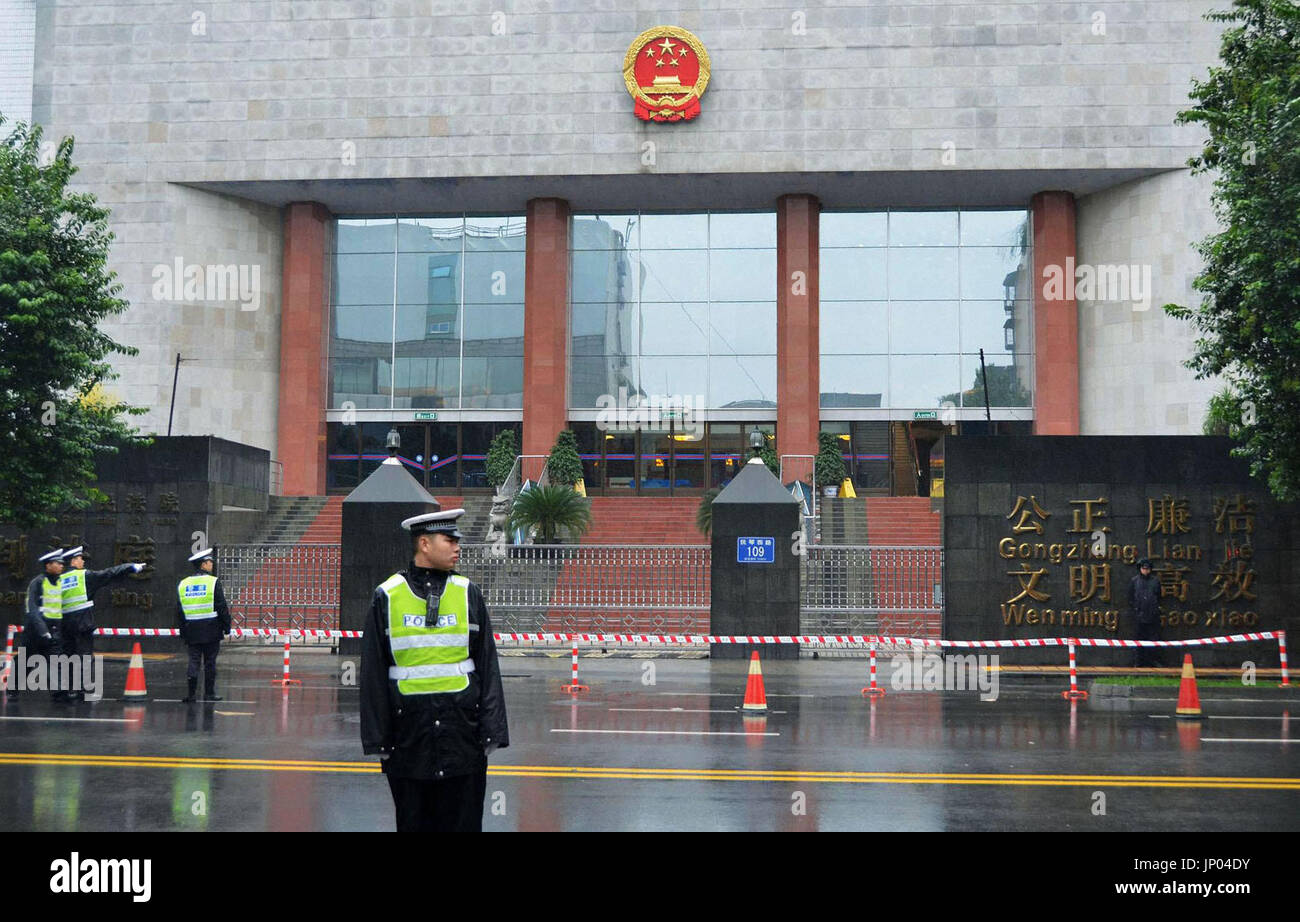 CHENGDU, China - Police officers stand guard in front of the Chengdu ...