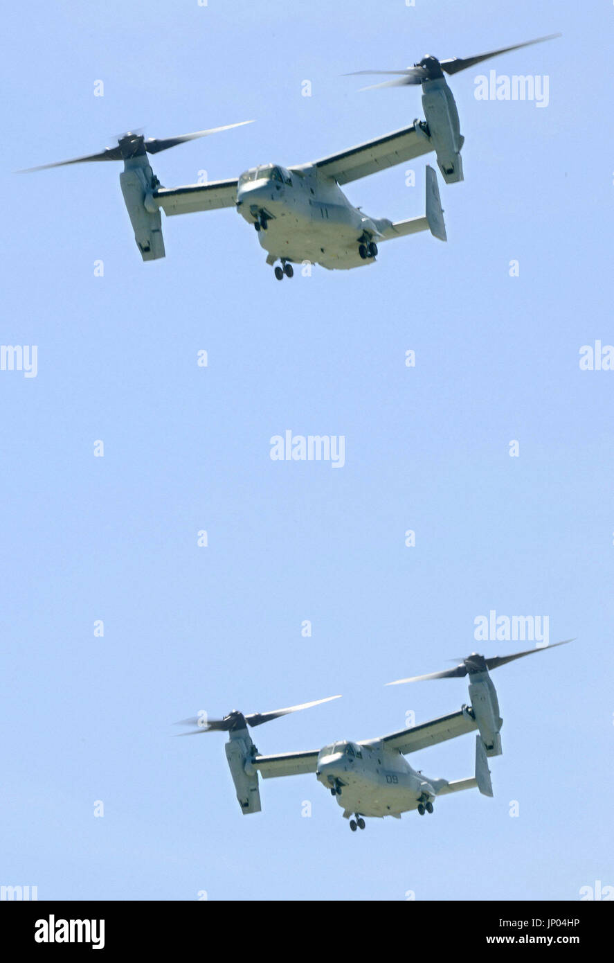 IWAKUNI, Japan - Two of the U.S. Marine Corps' Osprey military aircraft ...